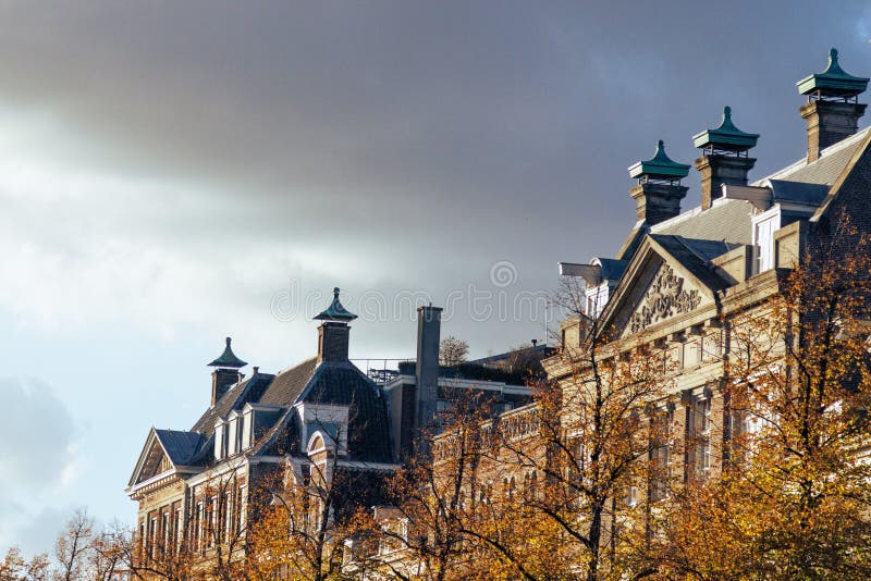 Overcast Skies and Rooftops of Old Buildings Stock Photo - Image of ...