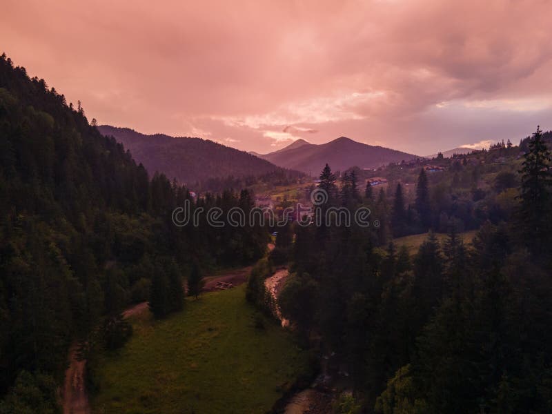 Overcast Sunset Above Mountains Stock Photo - Image of scenic, aerial ...