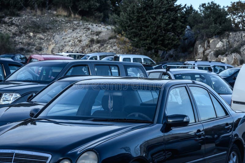 Overcrowded Parking Lot with Rows of Cars in a Remote Open Space Stock ...