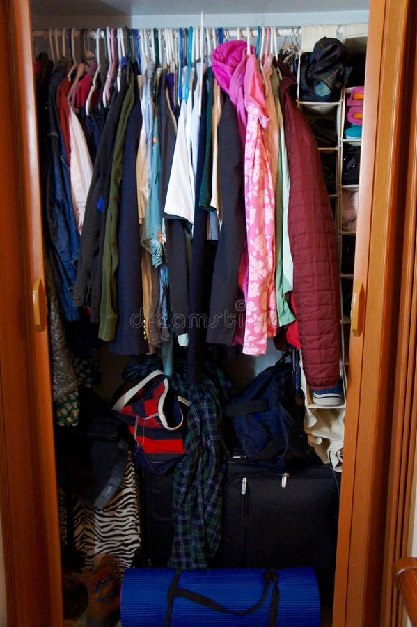 Overcrowded Small Clothes Closet Stock Image - Image of shirts, room ...