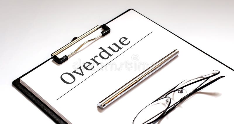 OVERDUE Concept on White Sheet with Pen and Glasses Stock Image - Image ...