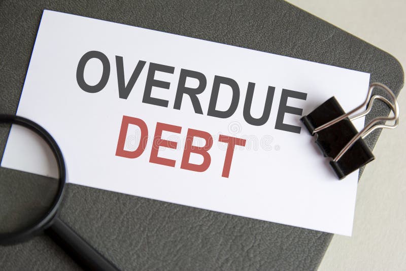 OVERDUE DEBT Word on Paper and Magnifying Lens Stock Image - Image of ...