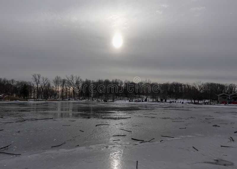 Overexposed Sun Behind Deciduous Trees in Winter Reflecting into the ...