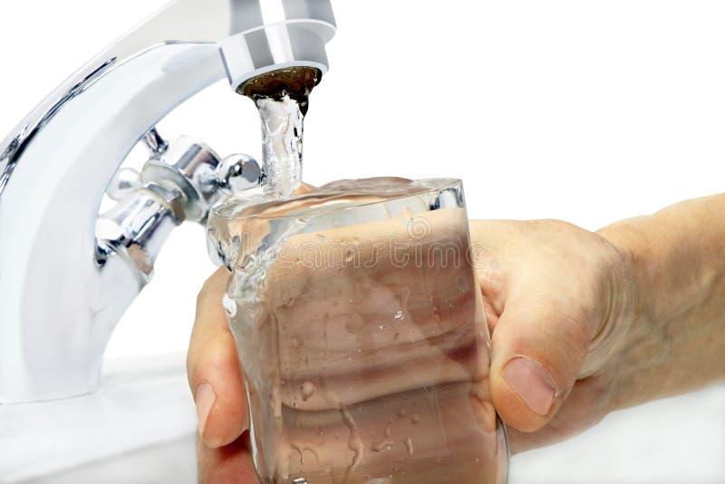 Overfilling glass of water stock photo. Image of thumb - 12656844