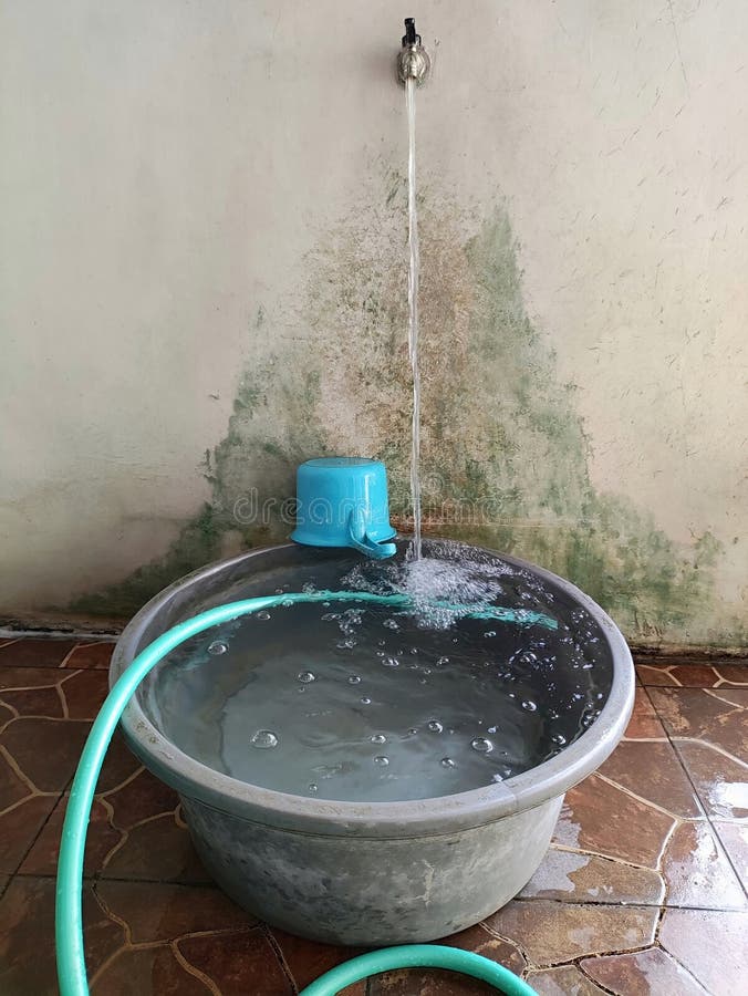 Overflowing bucket stock image. Image of background - 316597793