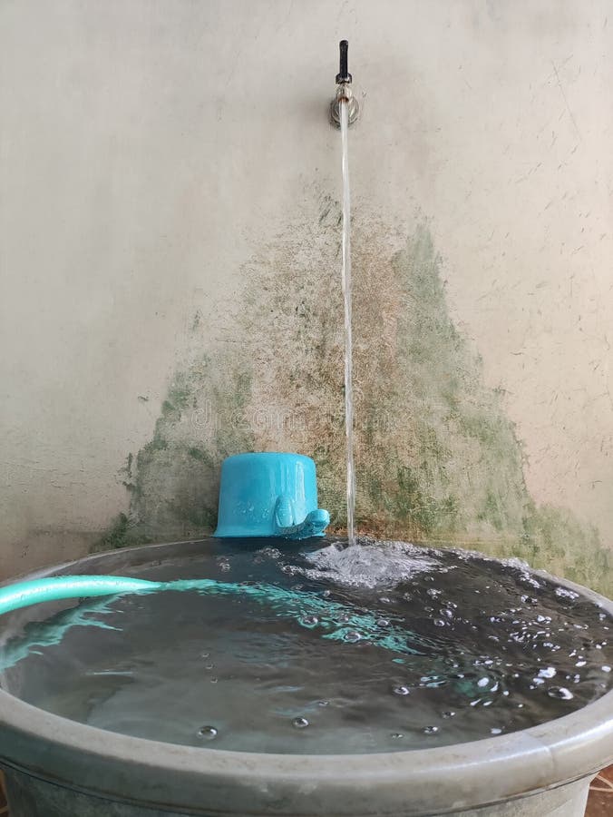 Overflowing bucket stock photo. Image of droplets, freshness - 316597802