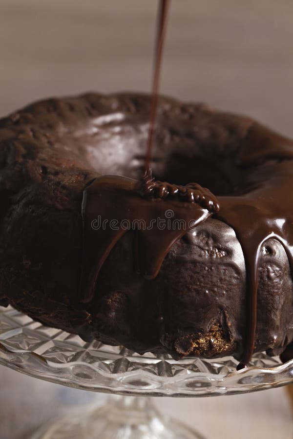 Overflowing Bundt Cake with Chocolate Dressing Stock Image - Image of ...