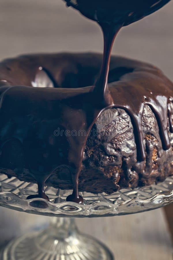 Overflowing Bundt Cake with Chocolate Dressing Stock Photo - Image of ...