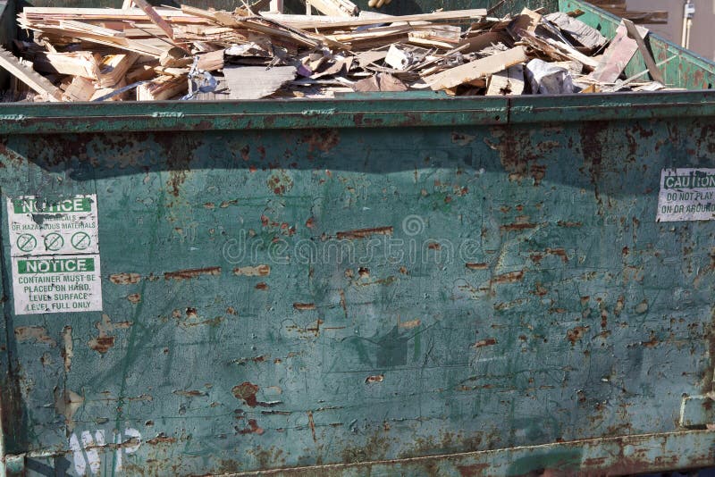 Overflowing Dumpster with Scrap Wood Stock Photo - Image of dumpster ...