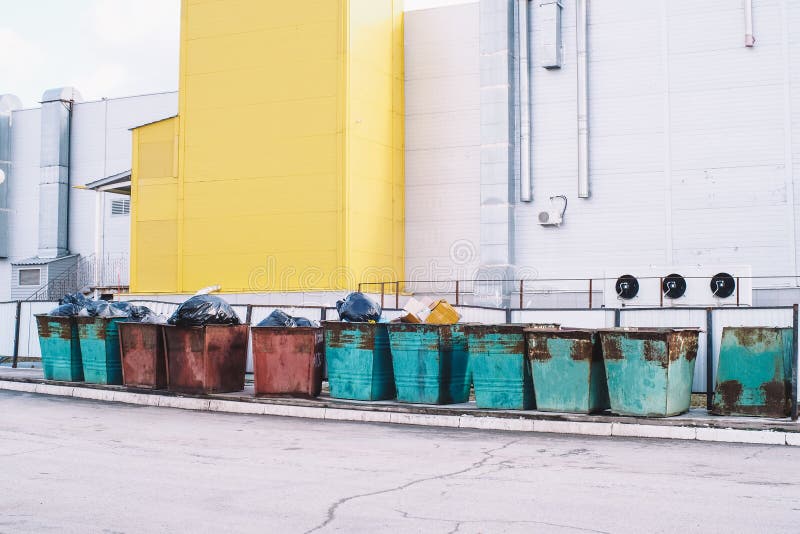 Overflowing Garbage Containers with Garbage Near an Industrial Building ...