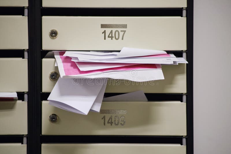 An Overflowing Mailbox in the Lobby of an Apartment Building. Mailboxe ...