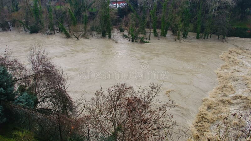 Overflowing river flood stock footage. Video of disaster - 138303058