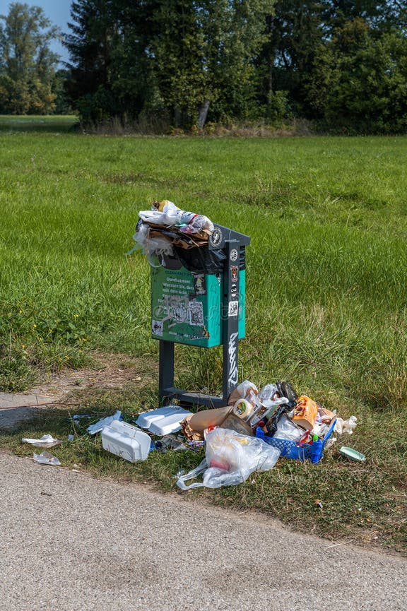 Overflowing Trash Can in a Park Editorial Stock Photo - Image of ...