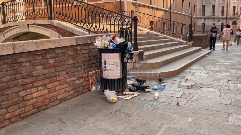 Overflowing Trash Can in a Square in Venice Stock Video - Video of ...