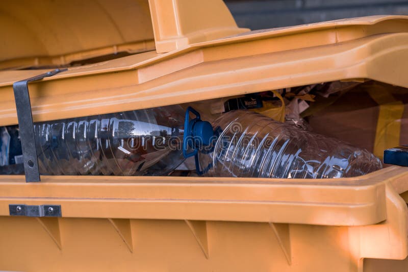 Overflowing Yellow Container for Plastic Waste. Waste Sorting Stock ...