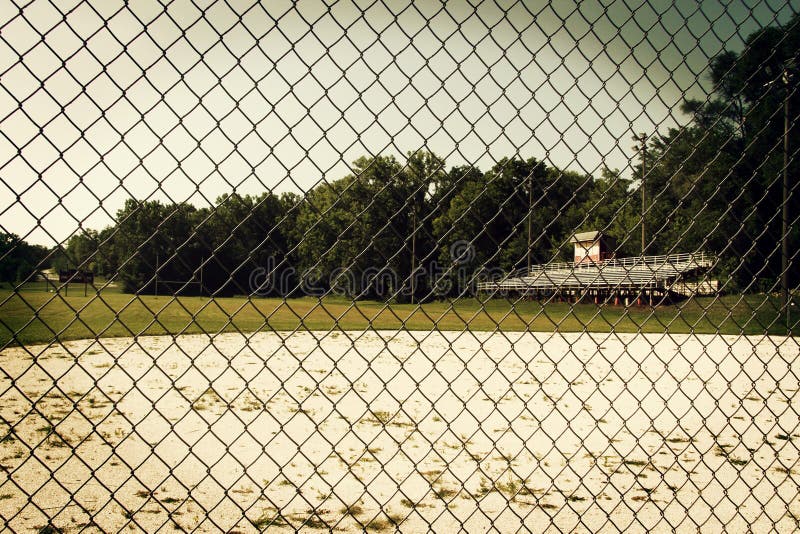 An Overgrown Baseball Diamond Stock Photo - Image of skies, overgrown ...