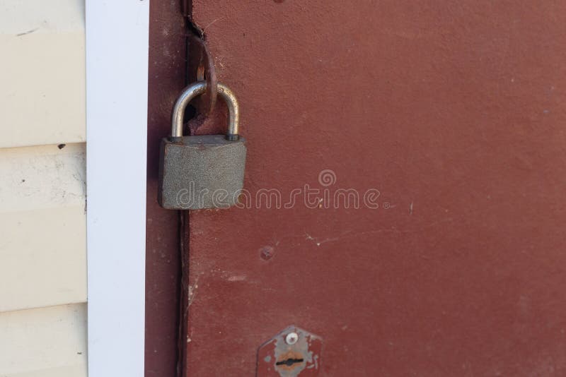 Overhang Lock Hangs on the Red Iron Door Stock Image - Image of rough ...