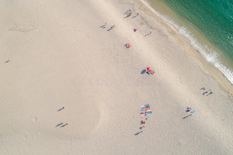 Overhead Aerial View of a Beach with People and Umbrellas Stock Photo ...