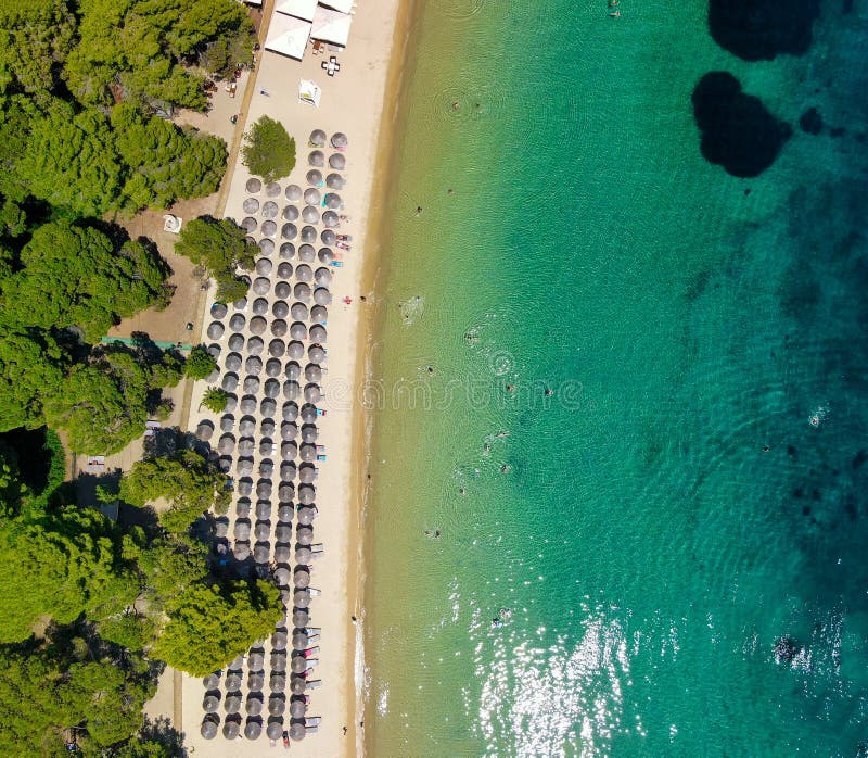 Overhead Aerial View of Beach Umbrellas Along a Beautiful Beach Stock ...