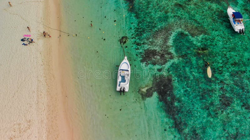 Overhead Aerial View of Swimmers on a Beautiful Beach from a Drone ...