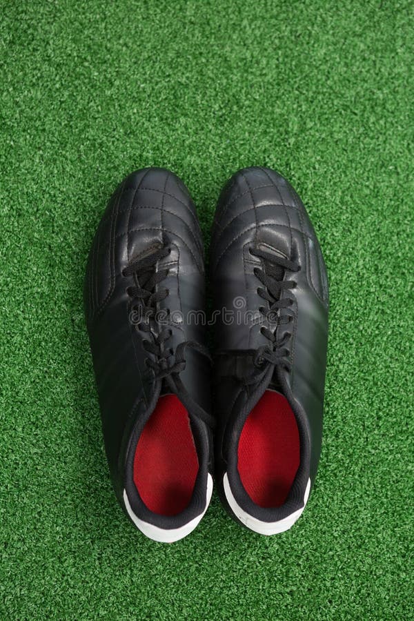 Cleats on artificial grass stock image. Image of turf - 101344351