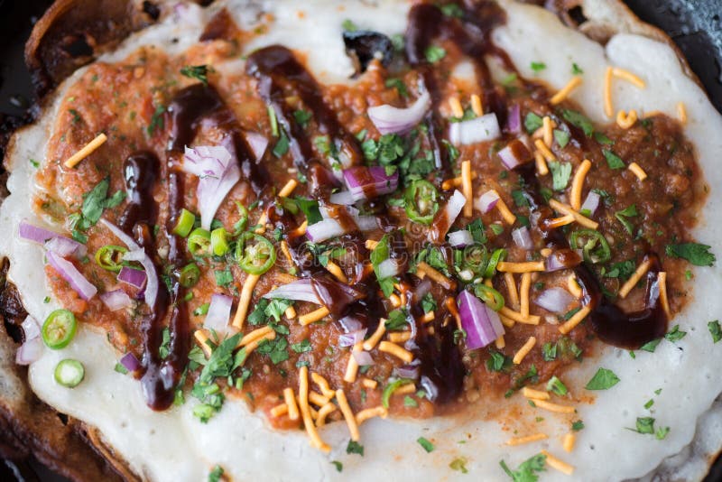 Overhead Closeup of Dosa on Hot Round Griddle Stock Image - Image of ...