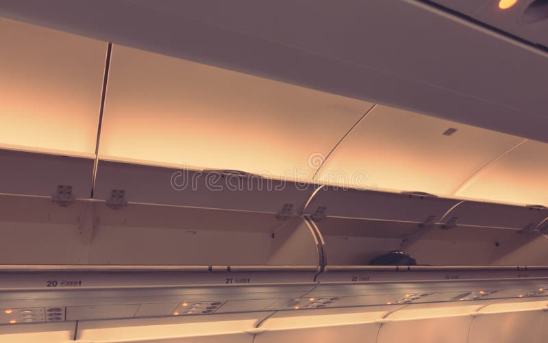 Overhead Compartment in Commercial Airplane .( Filtered Image Pr Stock ...