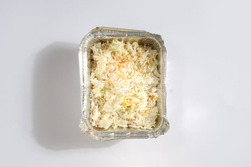 Overhead of Cooked White Rice in Foil Tray on White Background Stock ...