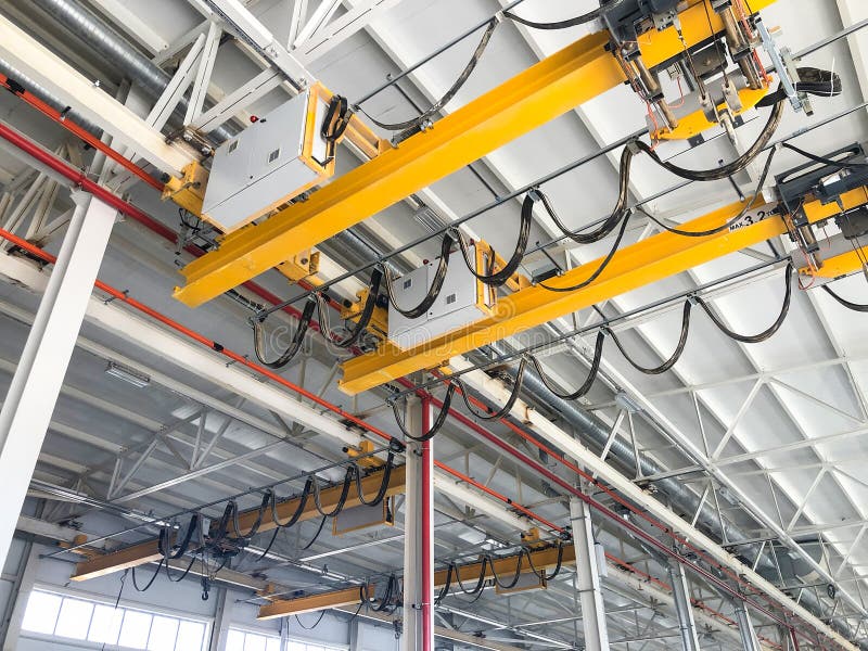 Overhead Cranes Inside Industrial Building. Bridge Cranes Inside Hangar ...