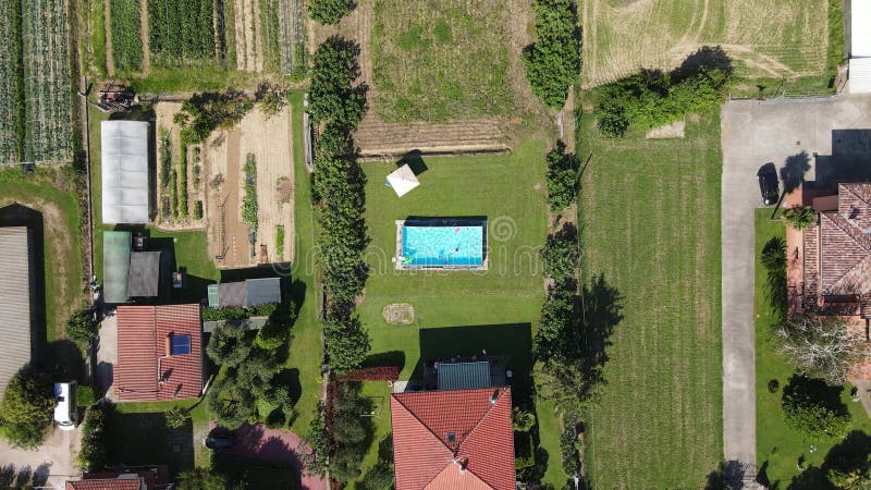 Overhead Downward Aerial View of Beautiful Pool in the Countryside ...