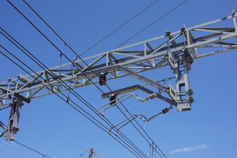 Overhead Electrical Power Lines Against Clear Blue Sky Stock Image ...