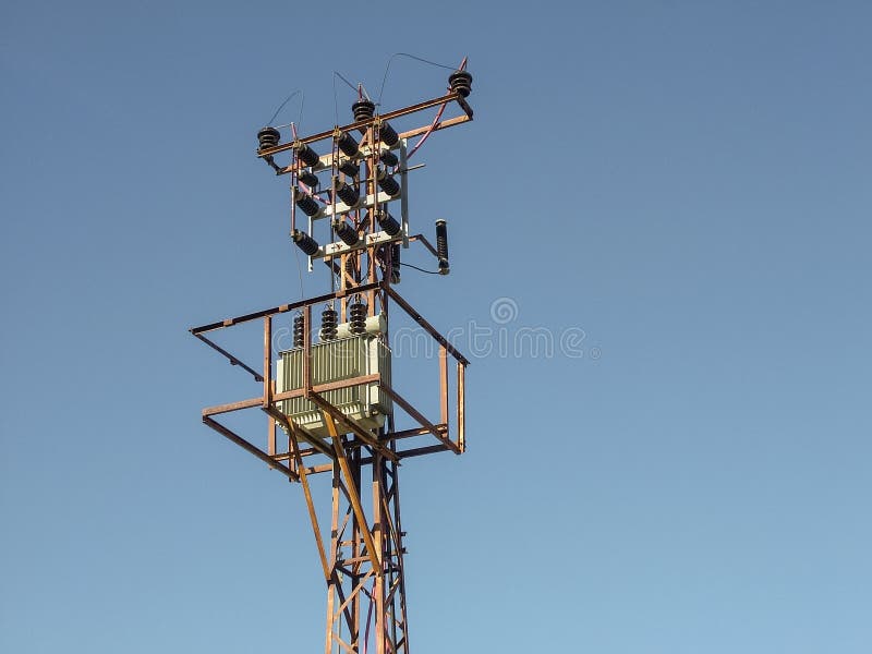 An Overhead Electrical Line with a Transformer Stock Photo - Image of ...