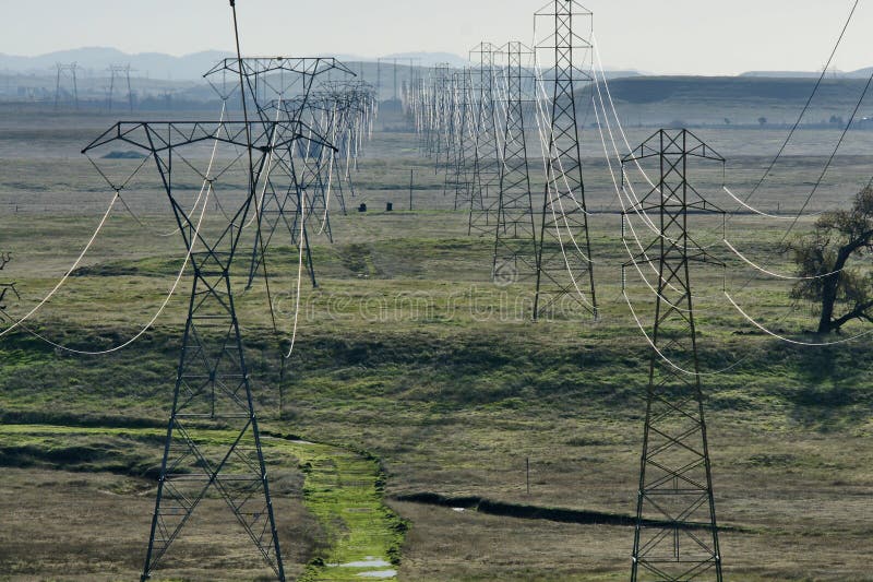 Overhead Electrical Transmissions Lines and Towers are Seen from an ...