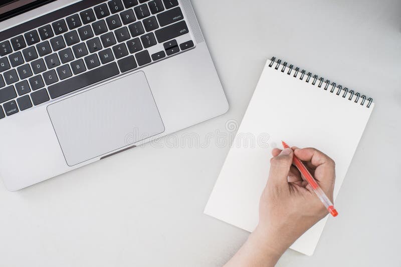 Overhead Image of People Taking Note in Front of Laptop Stock Photo ...