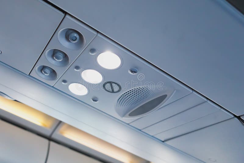 Overhead Light and Air Conditioner in Airplane Cabin Stock Image ...