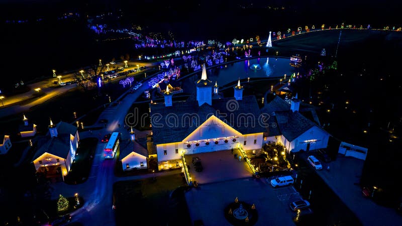 Overhead Night View of a Complex with Buildings Outlined in Lights, a ...
