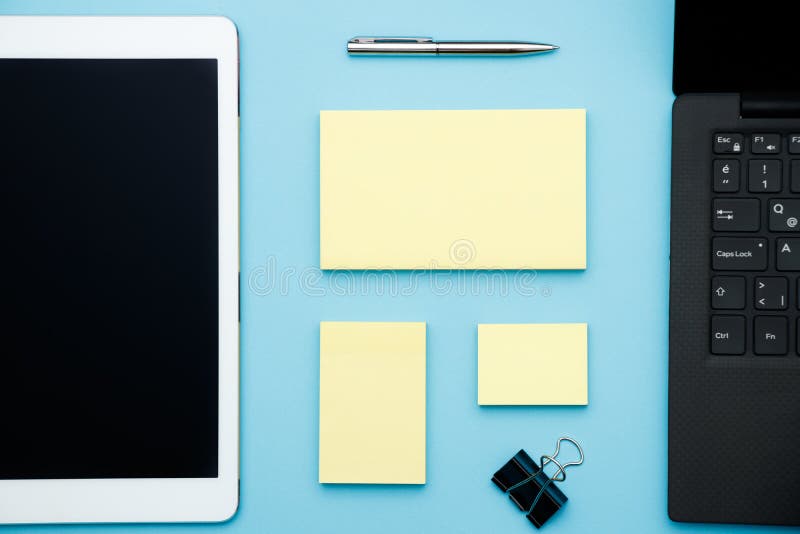 Overhead of Office Table with Laptop, Computer Keyboard, Tablet Stock ...