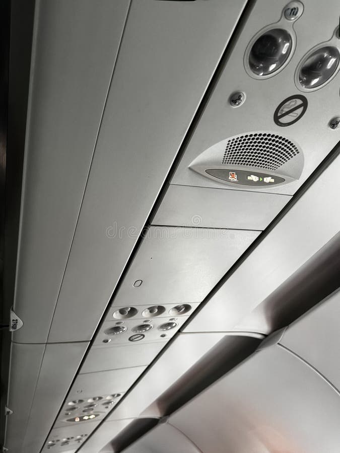 Overhead Panel of an Airplane, Including Air Vents, Reading Lights, and ...