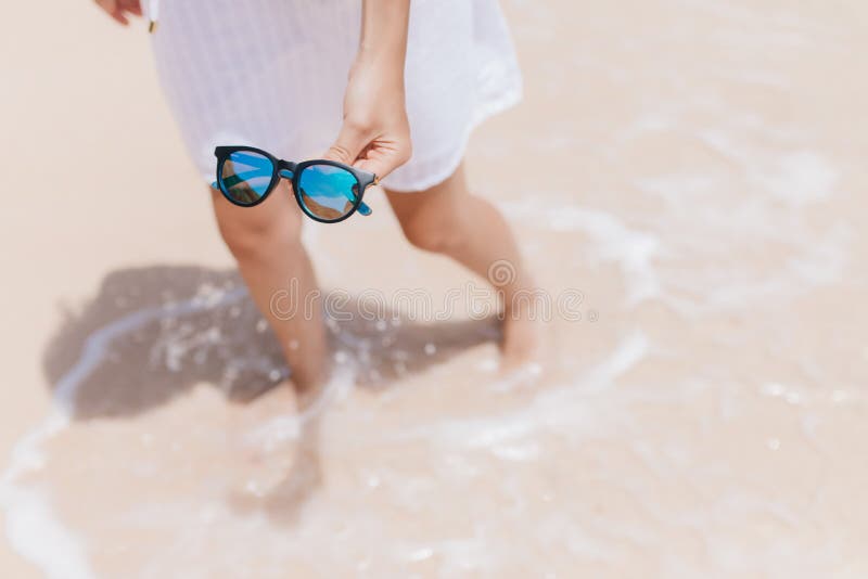 Overhead Portrait Of Woman Standing In Water At Coastline Outdoor