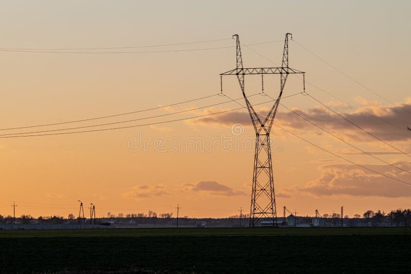 Overhead Power Line in the Countryside at Sunset Stock Photo - Image of ...