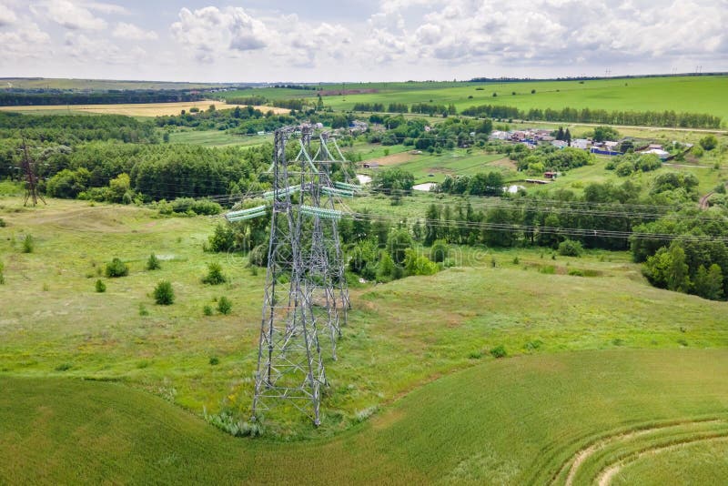 Overhead Power Line Transmission Tower at Summer. Stock Image - Image ...