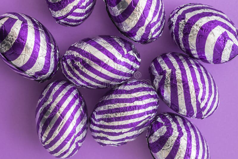 Overhead of Purple Striped Easter Eggs on Purple Background Stock Image ...