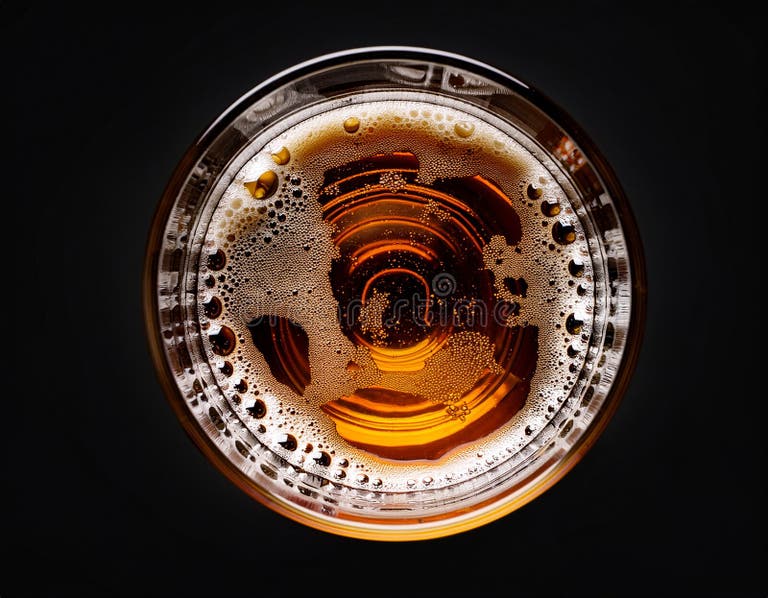 An Overhead Shot of Beer Bubbles Forming Intricate Patterns Inside a ...