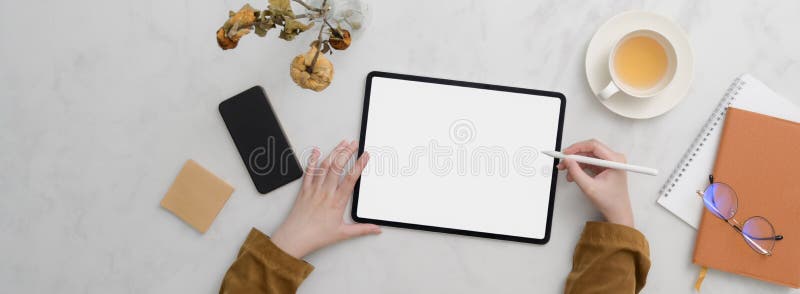 Overhead Shot of College Student Doing an Assignment on Marble Table ...
