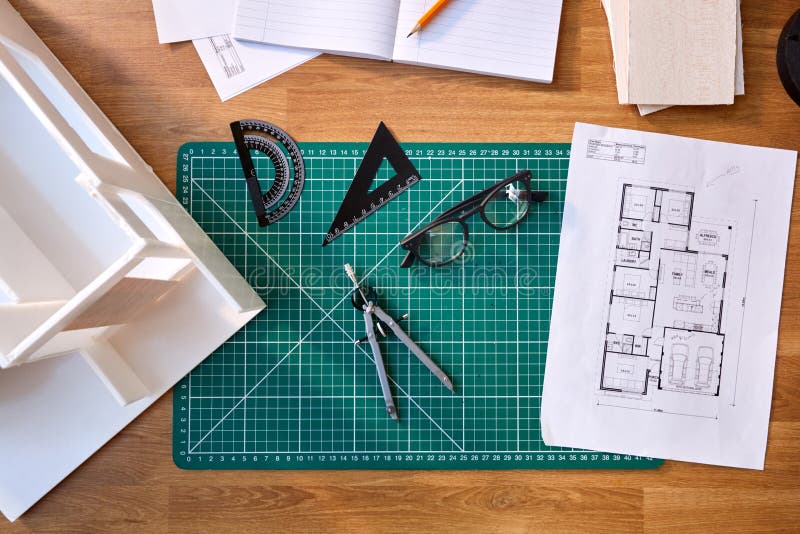Overhead Shot of Desk in Architects Office with Plans Drawing ...
