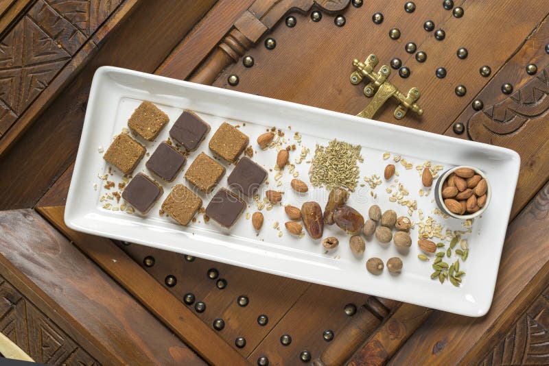 Overhead Shot of Different Types of Nuts and Square-shaped Nuts on a ...