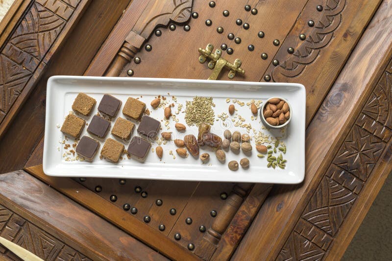 Overhead Shot of Different Types of Nuts and Square-shaped Nuts on a ...