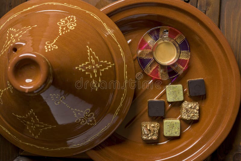 Overhead Shot of Different Types of Square-shaped Sweets with Tea on a ...