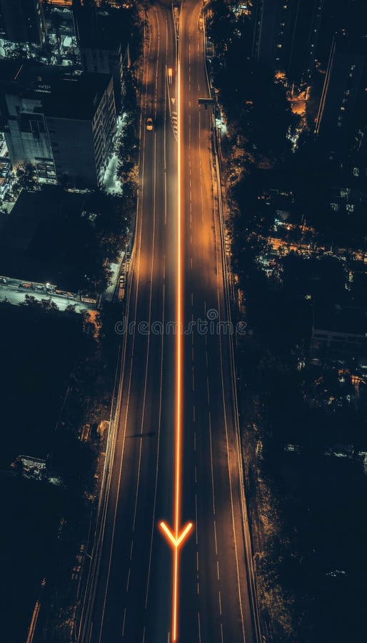 Overhead Shot of a Glowing Arrow on a Night Road, Symbolizing Progress ...