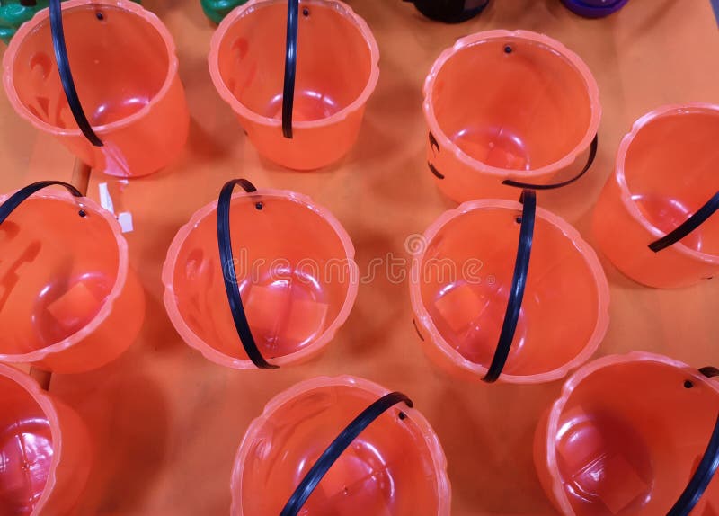 Overhead Shot of Numerous Pinkish-red Buckets Placed on the Ground ...